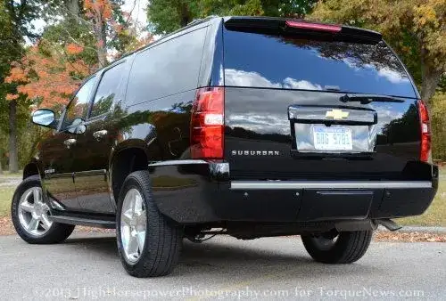 The rear side profile of the 2013 Chevrolet Suburban LTZ